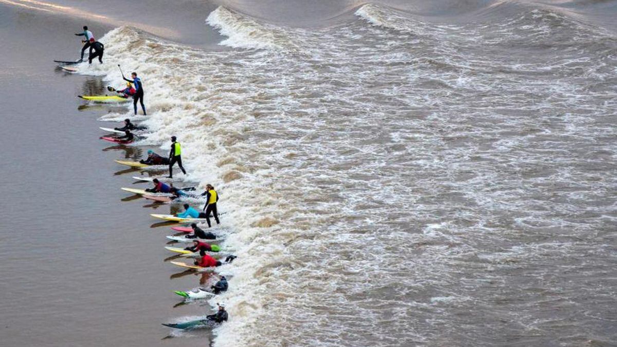 Brazilian surfer sets record by riding an 80-foot wave